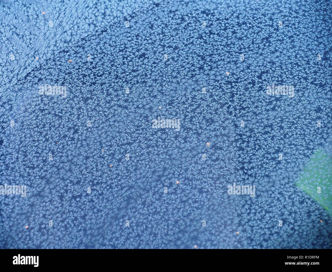 Ice crystals on the windshield of a car. Frost. Texture Stock Photo - Alamy