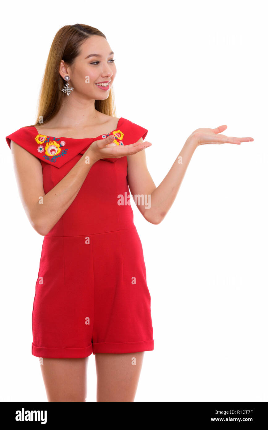 Smiling asian female presenting hi-res stock photography and images - Alamy