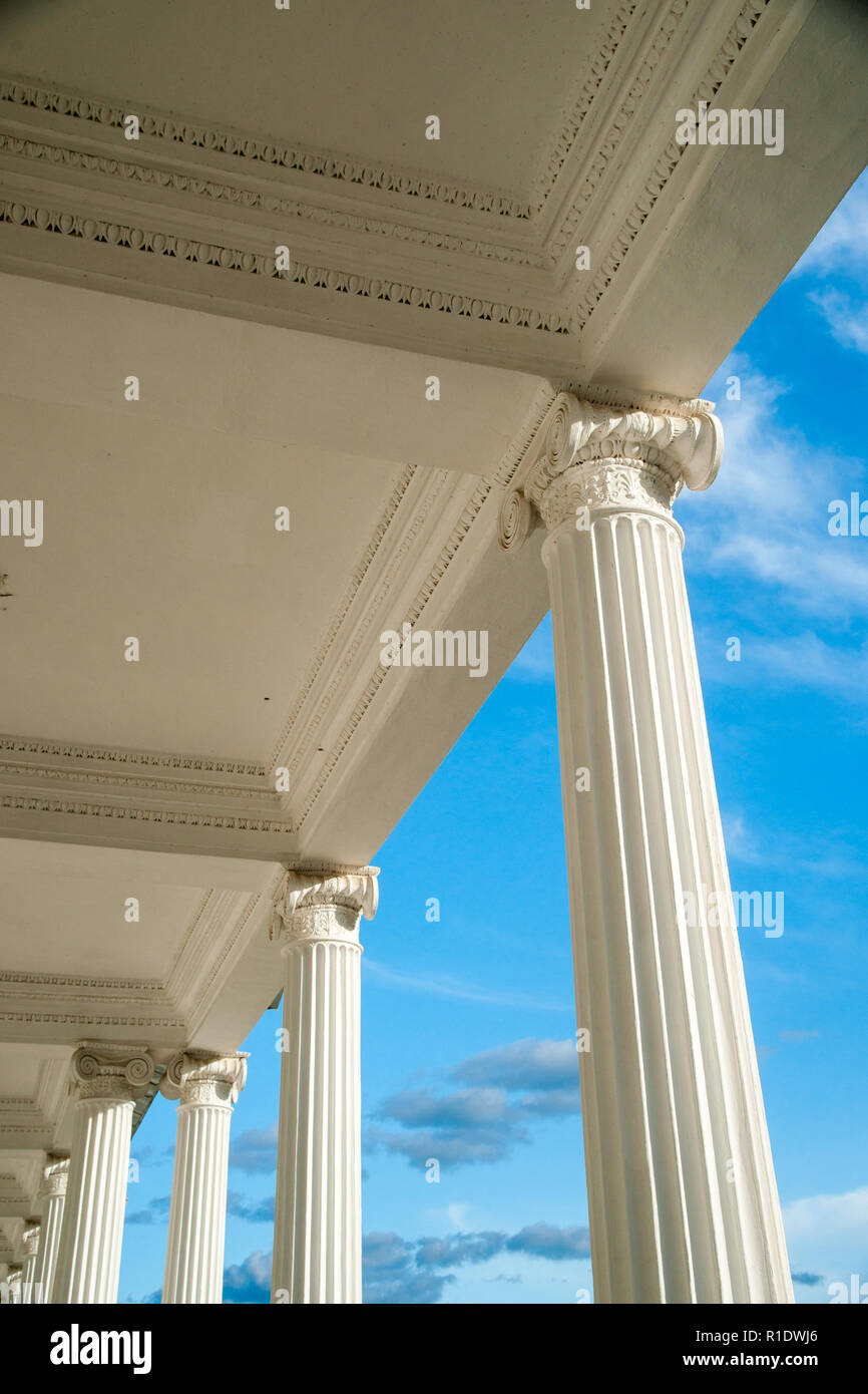 Columns on blue sky background Stock Photo - Alamy