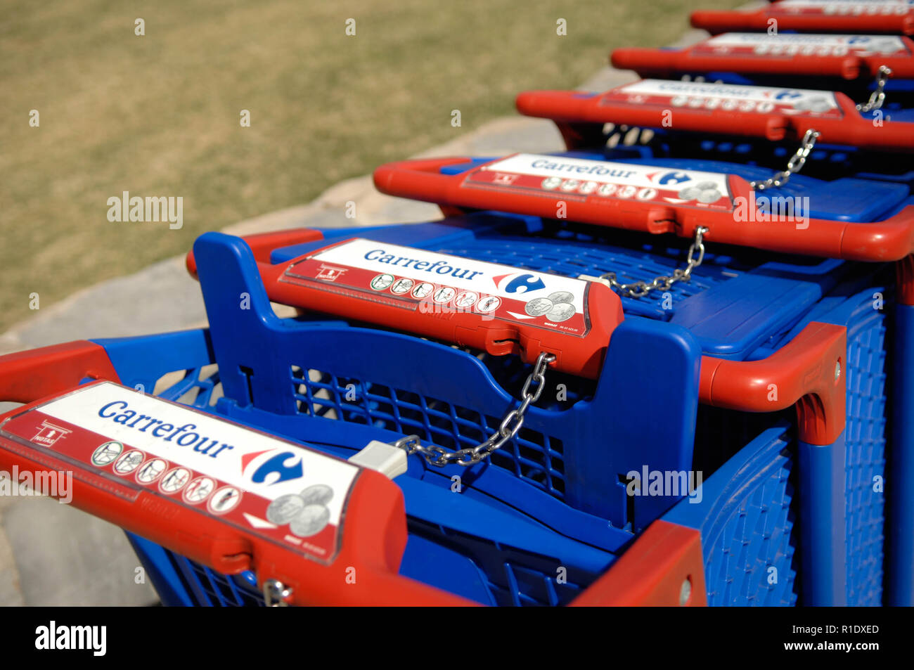 chained shopping carts Stock Photo - Alamy