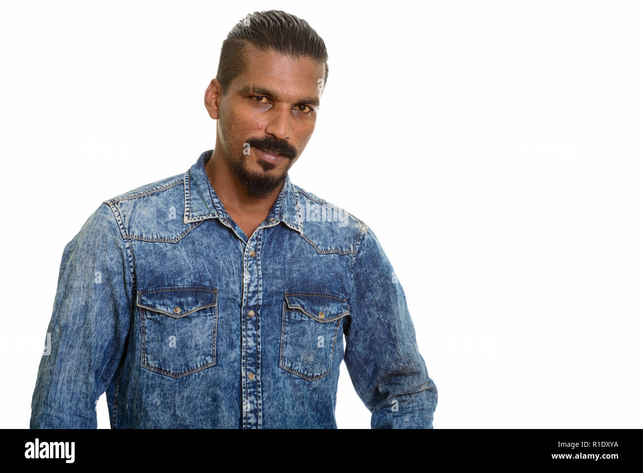 Young happy Indian man smiling studio portrait against white background ...