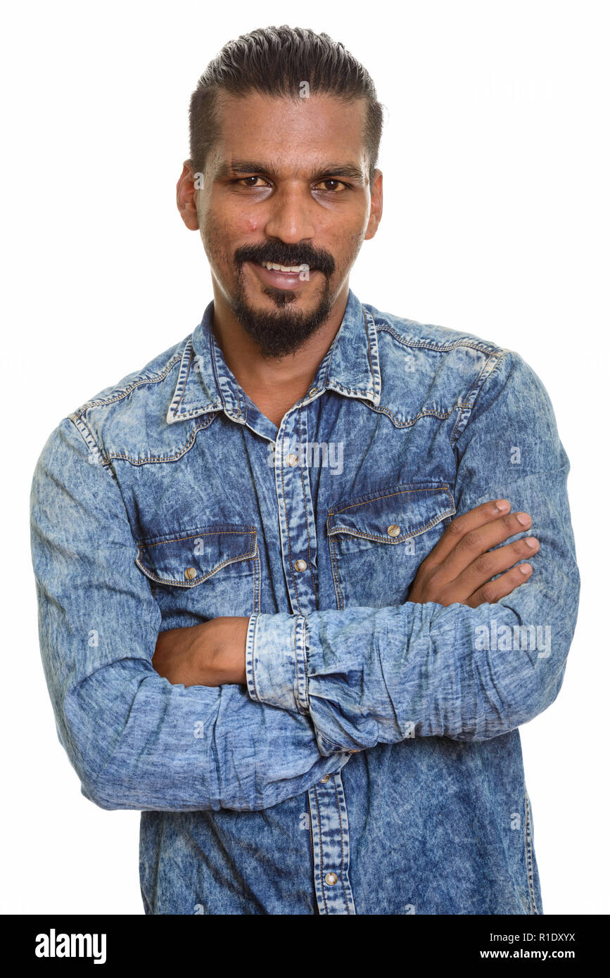 Young happy Indian man smiling studio portrait against white background ...