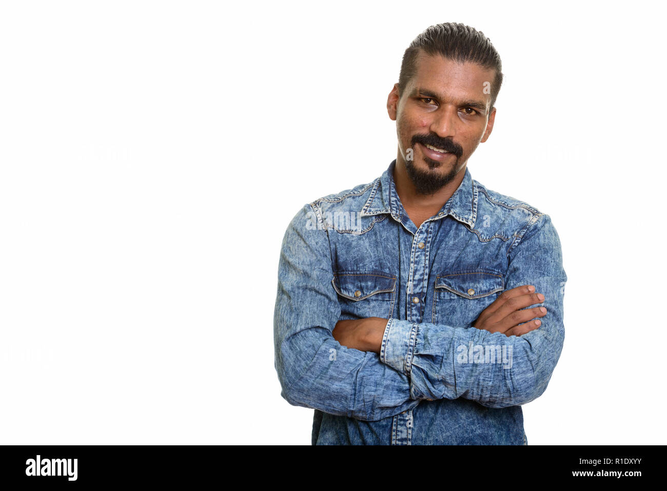 Young happy Indian man smiling studio portrait against white background ...