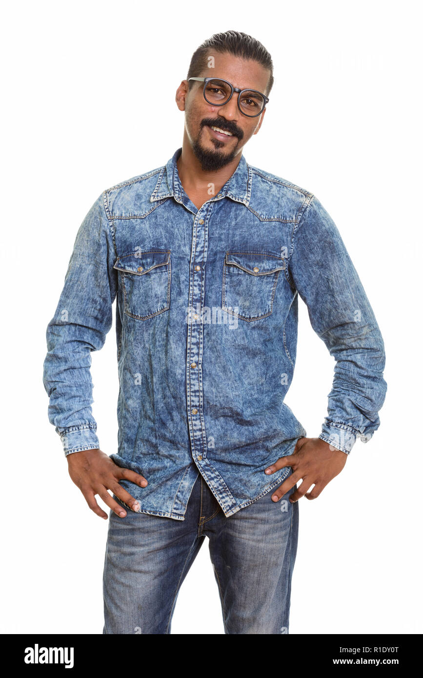 Young happy Indian man smiling studio portrait against white background ...