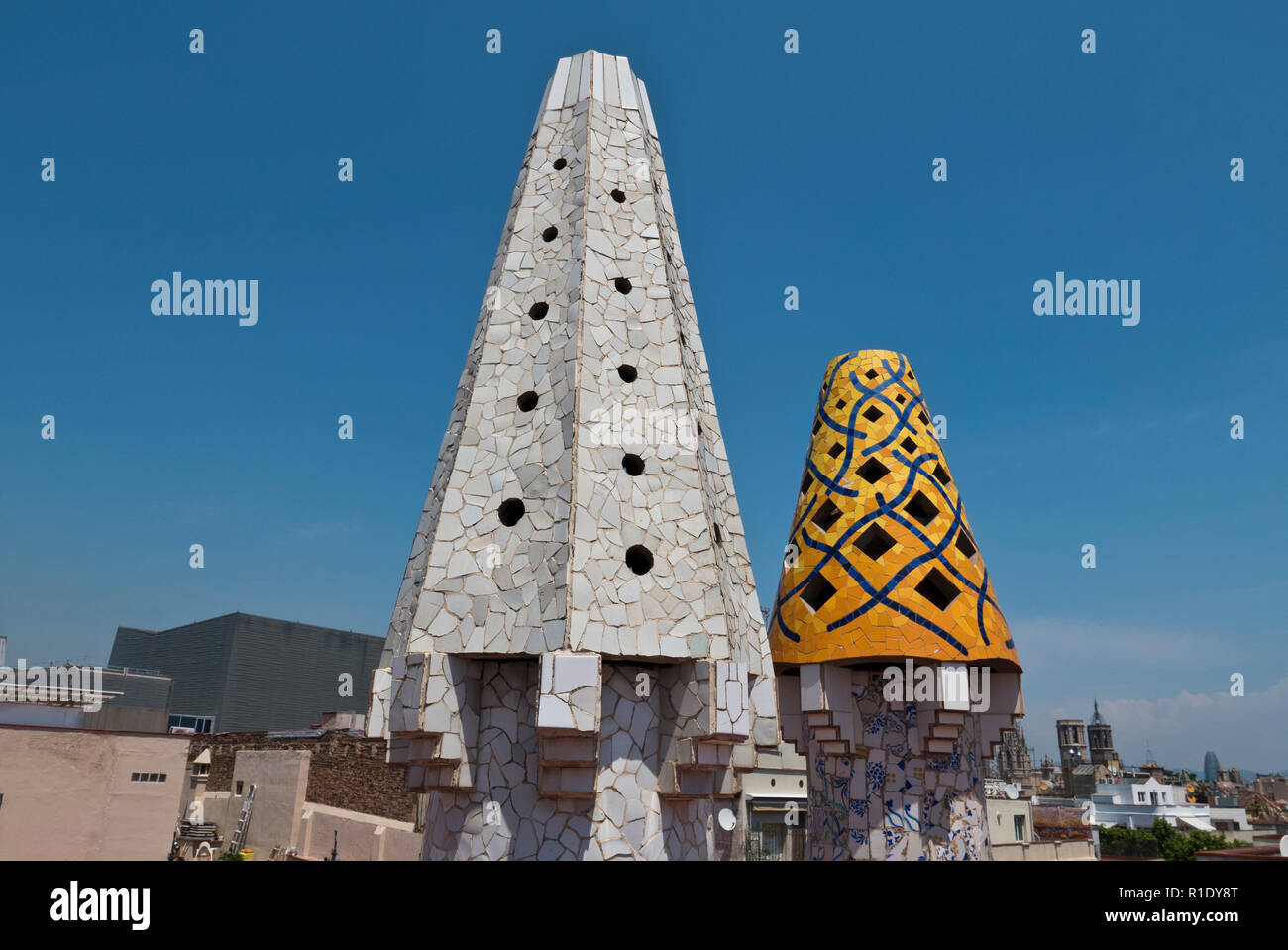 Bright coloured obelisk on the rooftop of the Palau Guell house ...