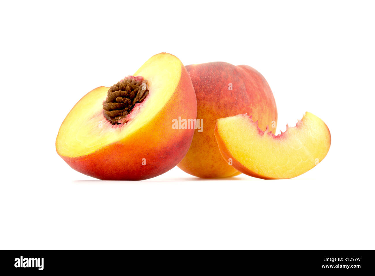 Peach fruit slice close up isolated on white background Stock Photo - Alamy