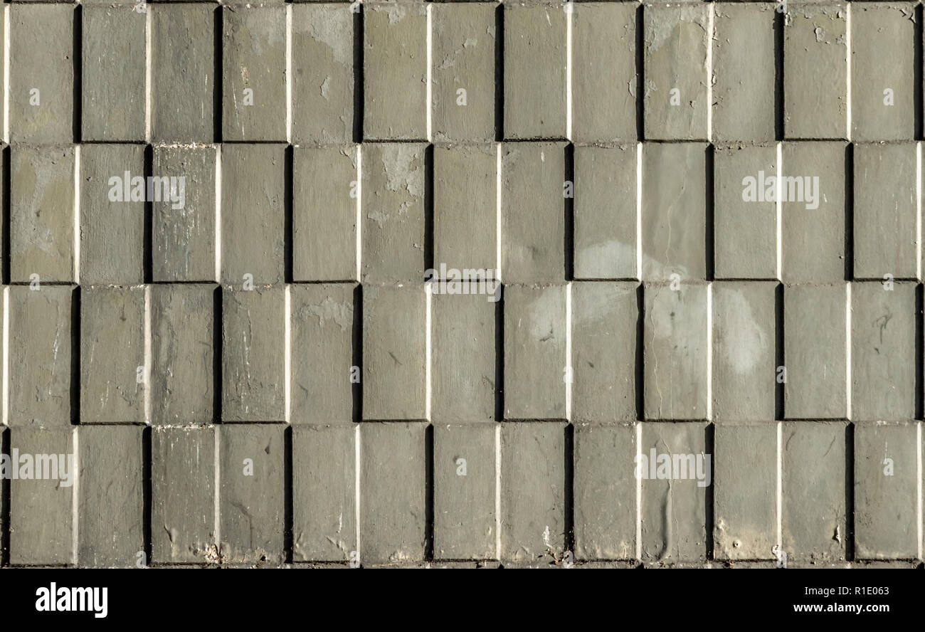 Rectangular patterned embossed block wall background Stock Photo - Alamy