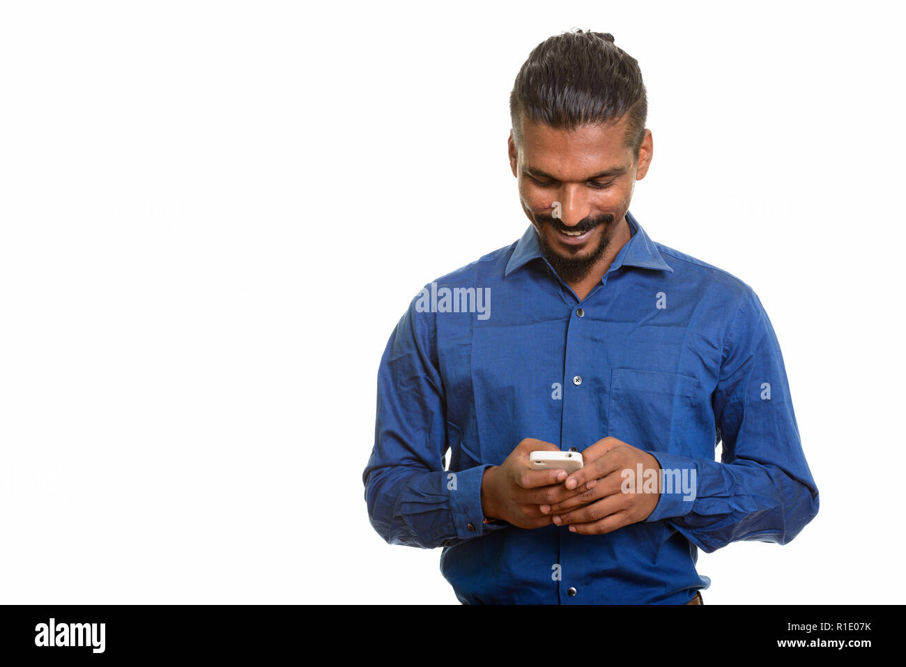 Indian businessman using cell hi-res stock photography and images - Alamy