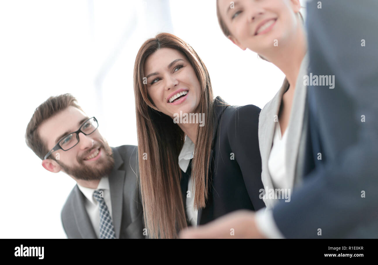 close up.successful employees listen to their boss Stock Photo - Alamy