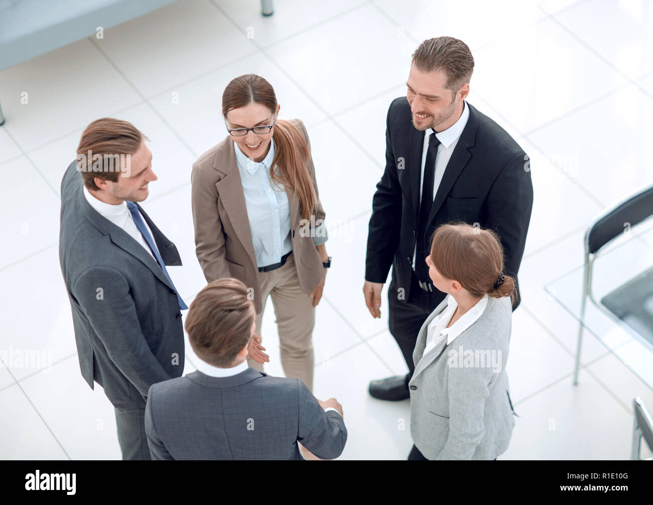 group of business people standing in the office reception Stock Photo ...