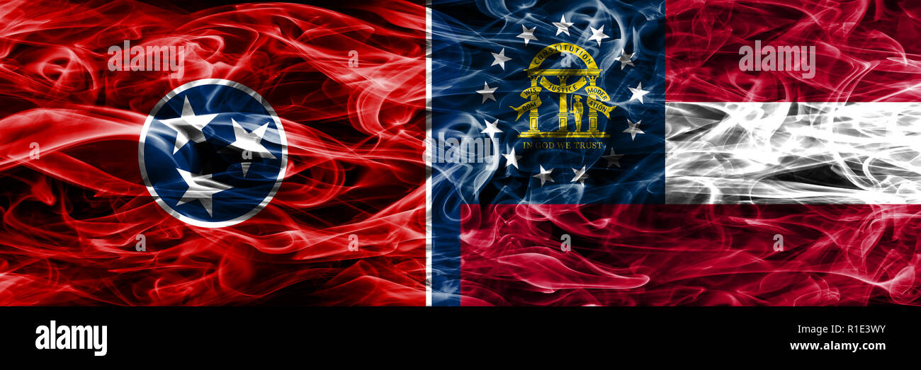 Tennessee vs Georgia colorful concept smoke flags placed side by side ...