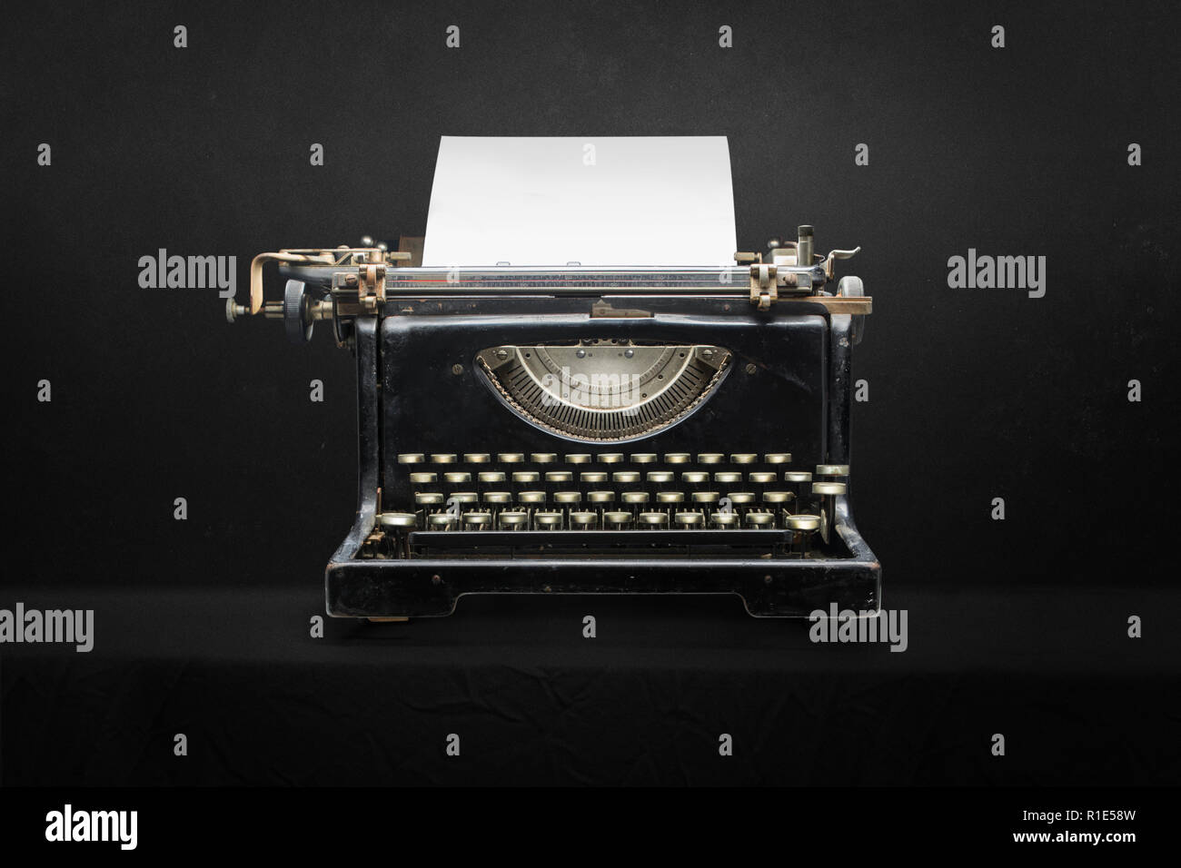 Typewriter on Black Background Front View Stock Photo - Alamy