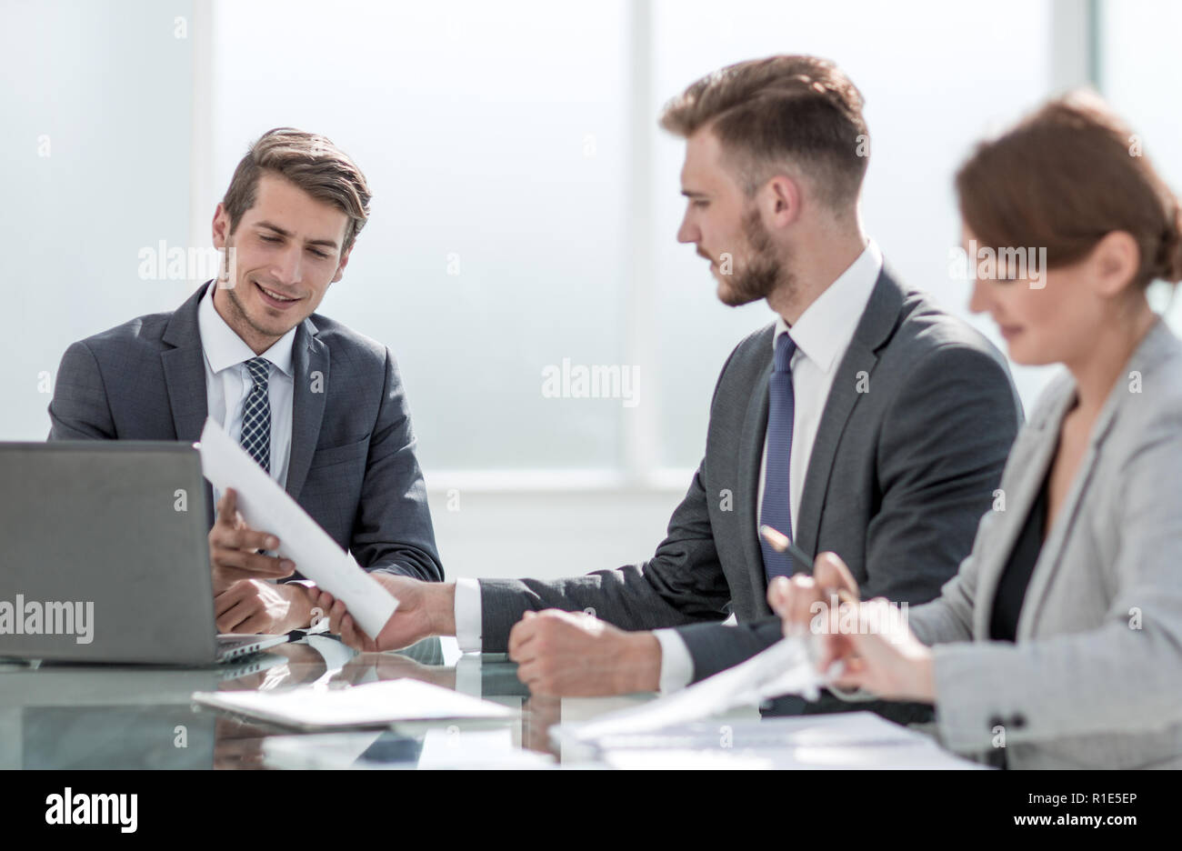 Businessmen desk documents communication hi-res stock photography and ...