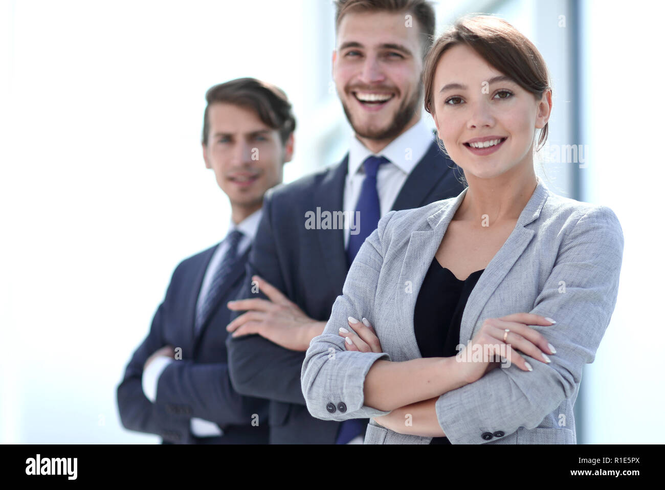 company employees standing together Stock Photo - Alamy