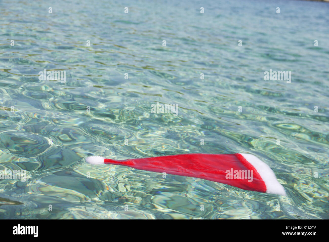 Santa hat floating in tropical hi-res stock photography and images - Alamy