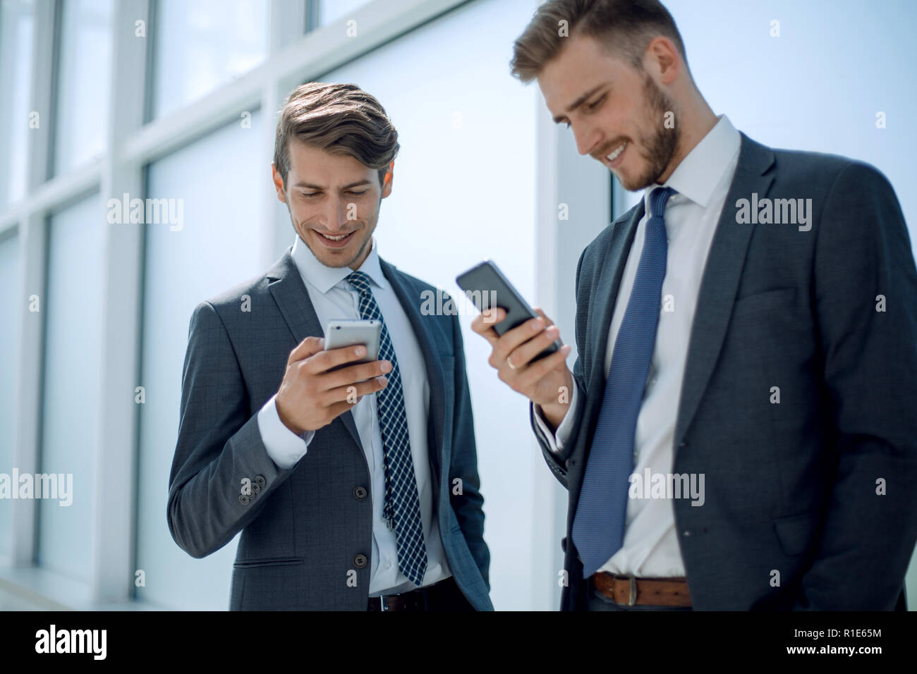 business colleagues talking outside the office window Stock Photo - Alamy