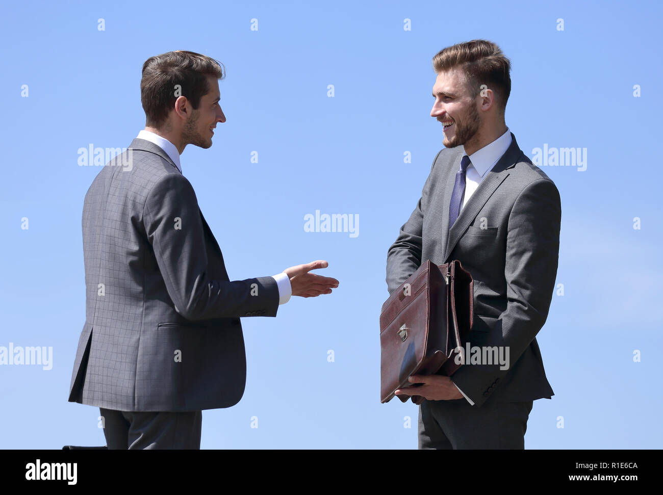 business colleagues communicate together Stock Photo - Alamy