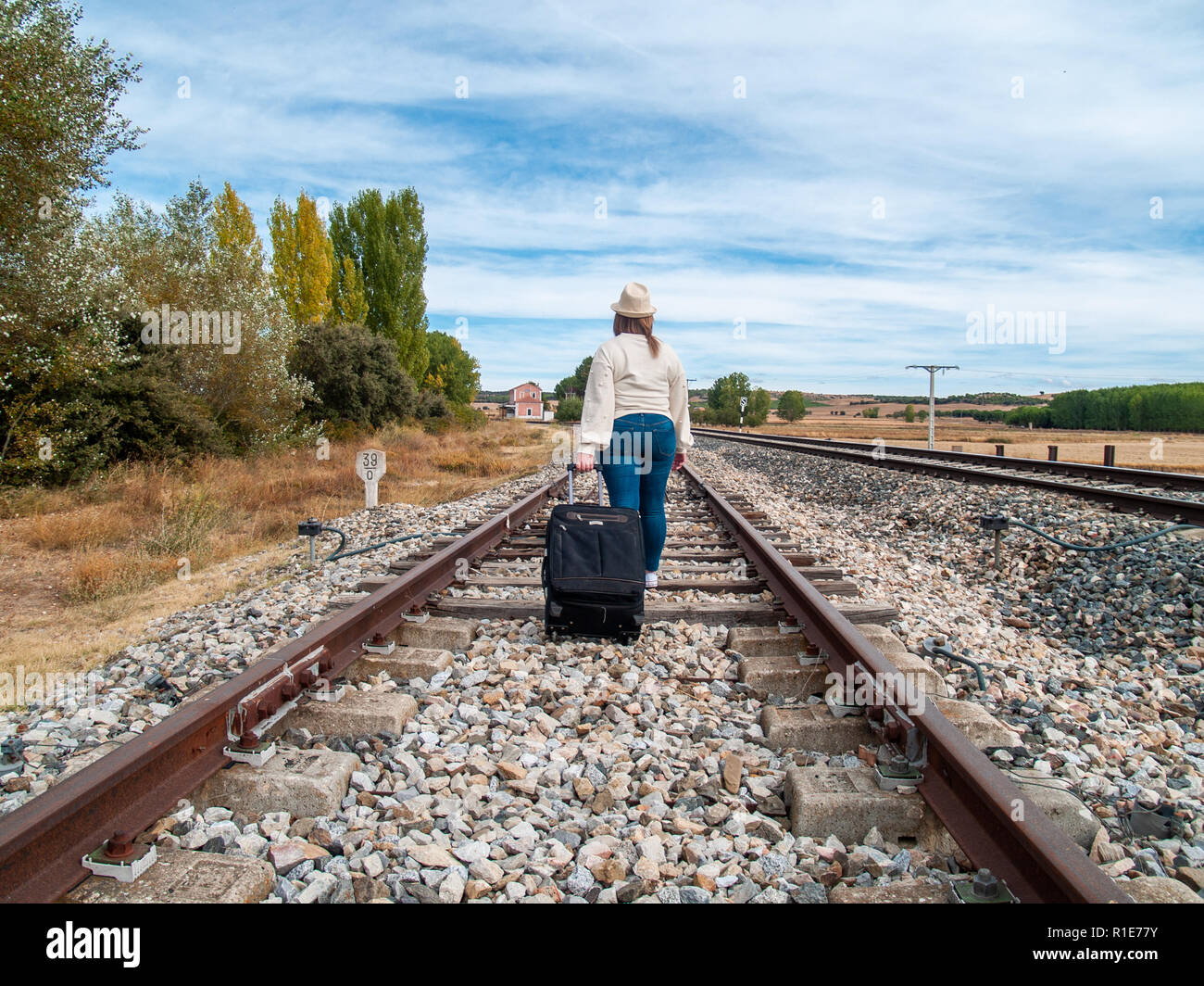 Sad girl on railway hi-res stock photography and images - Alamy