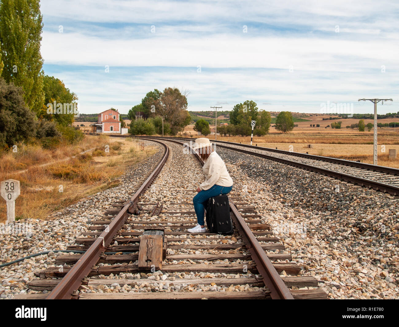 Sad girl on railway hi-res stock photography and images - Alamy