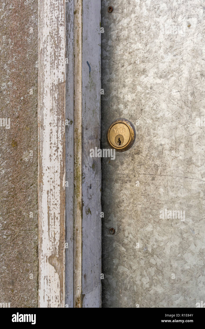 Outhouse door locked with a Yale latch lock. Locked in place, lock in ...