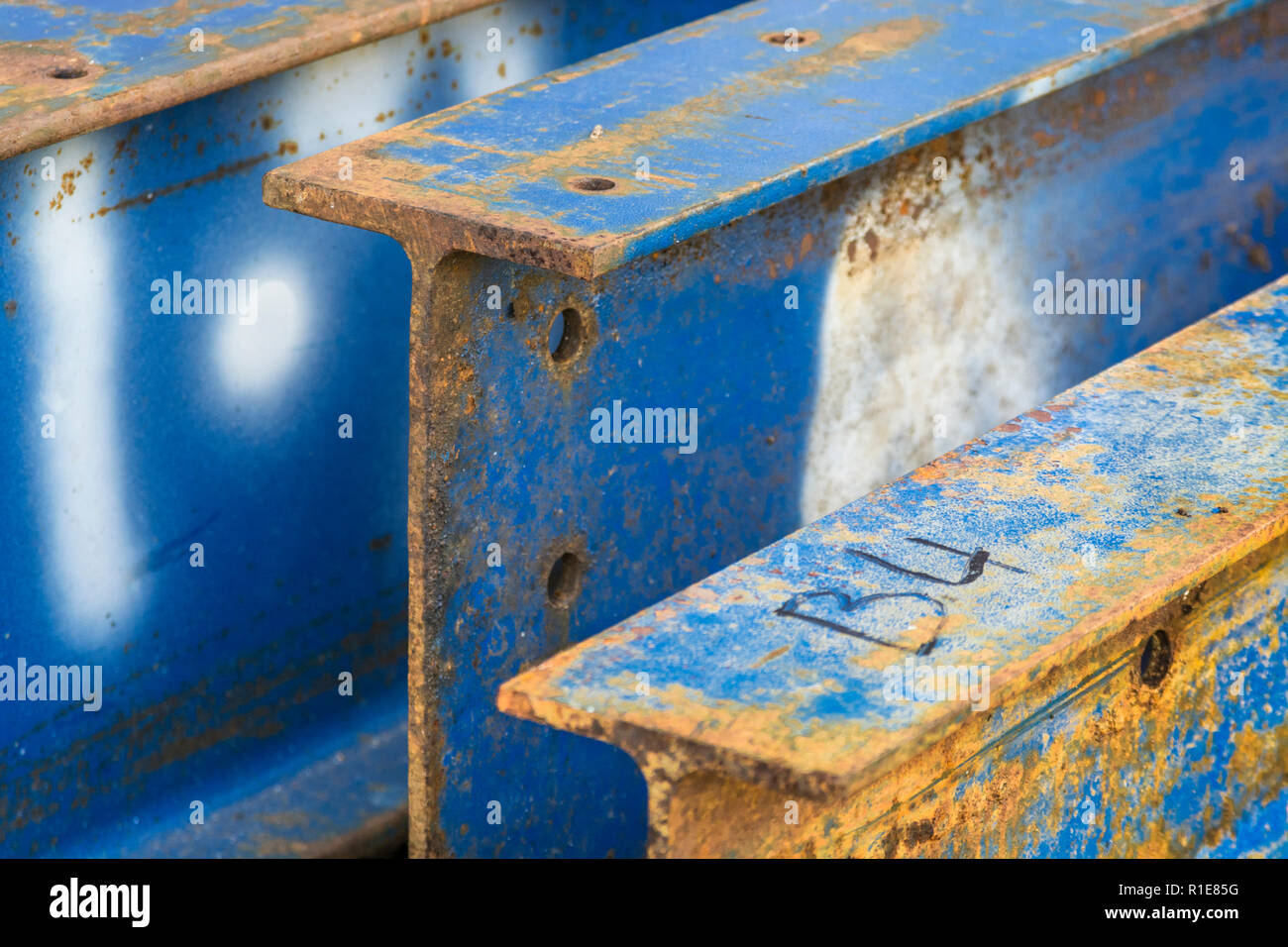 Rusty steel girders painted blue - awaiting use / installation Stock ...
