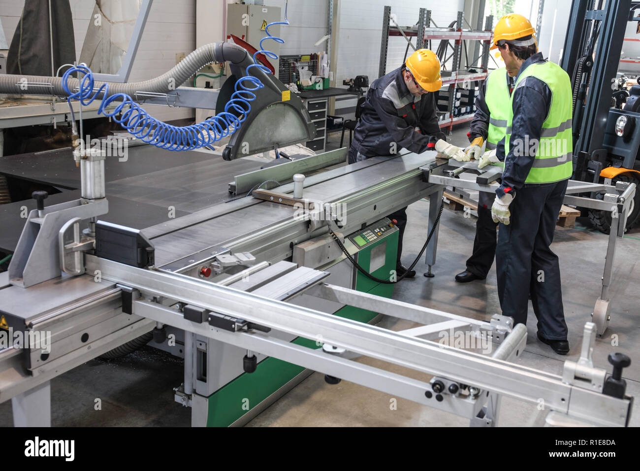 CNC machine shop with lathes, technicians and workers Stock Photo - Alamy