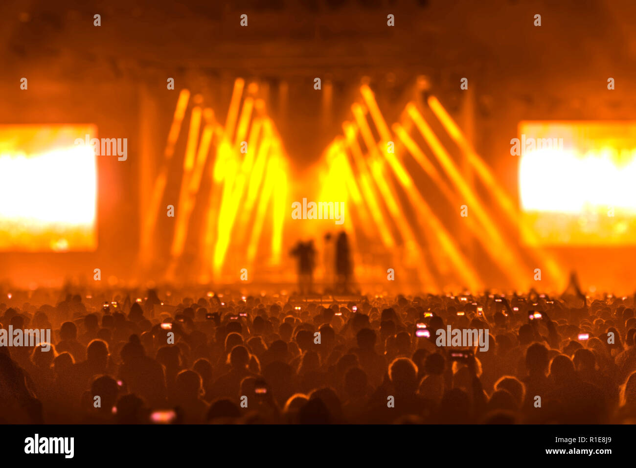 Concert field, crowded people and stage lights Stock Photo - Alamy