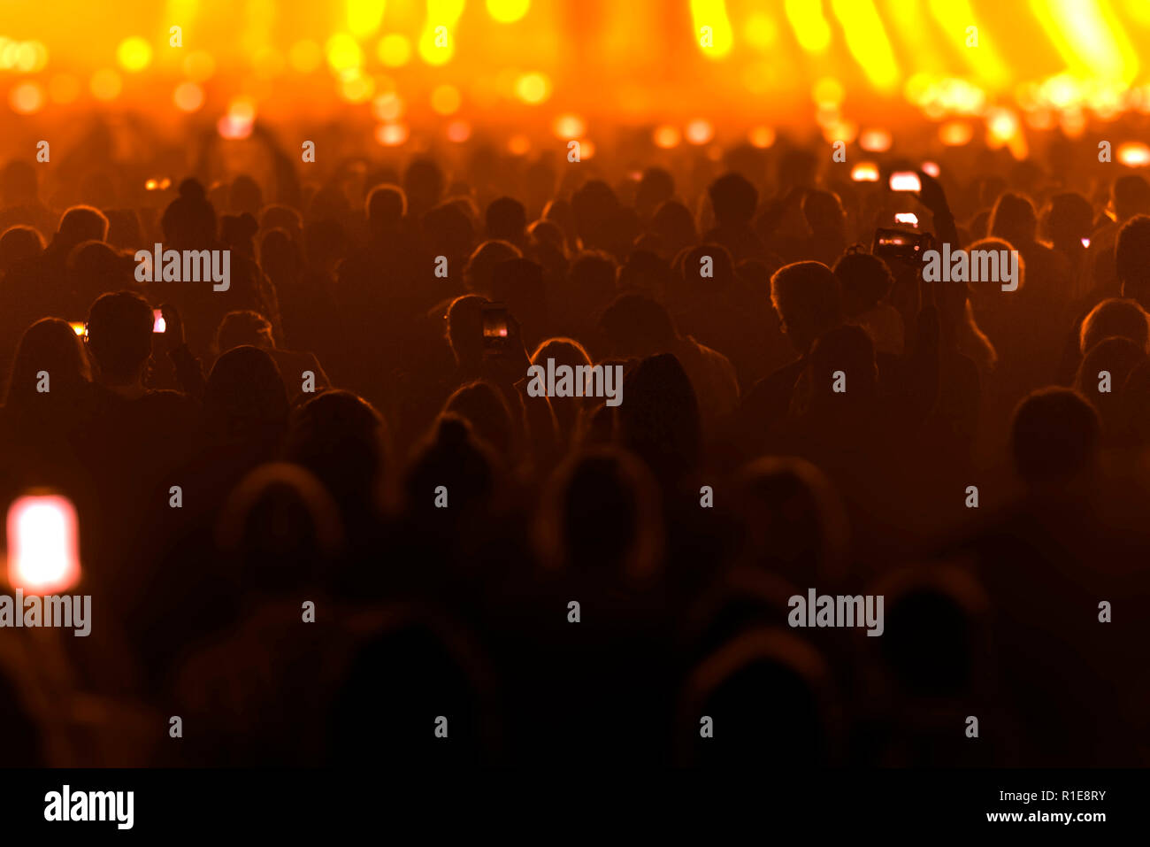 Concert field, crowded people and stage lights Stock Photo - Alamy