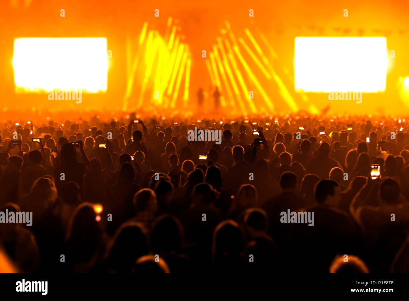 Concert field, crowded people and stage lights Stock Photo - Alamy