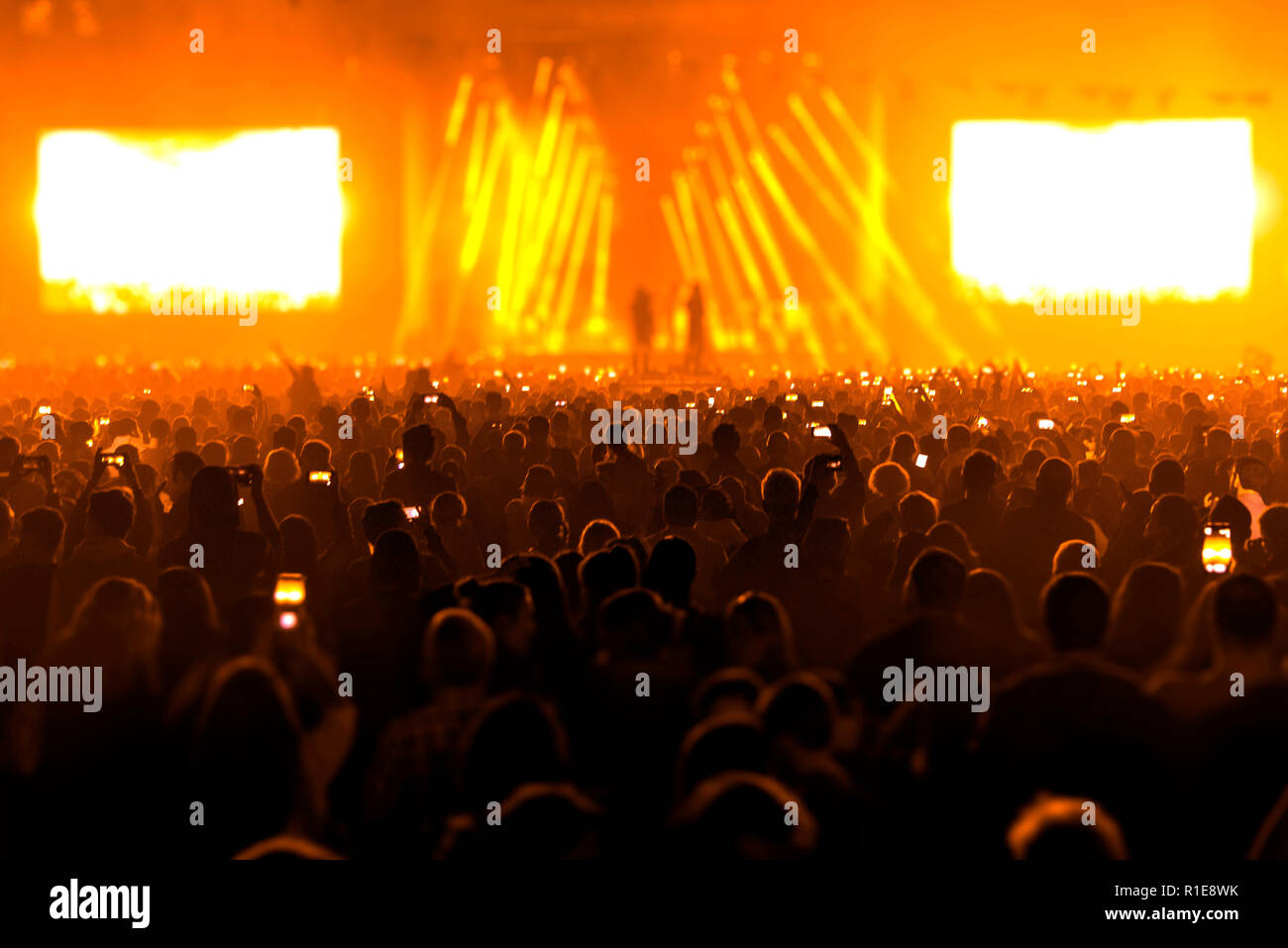 Concert field, crowded people and stage lights Stock Photo - Alamy