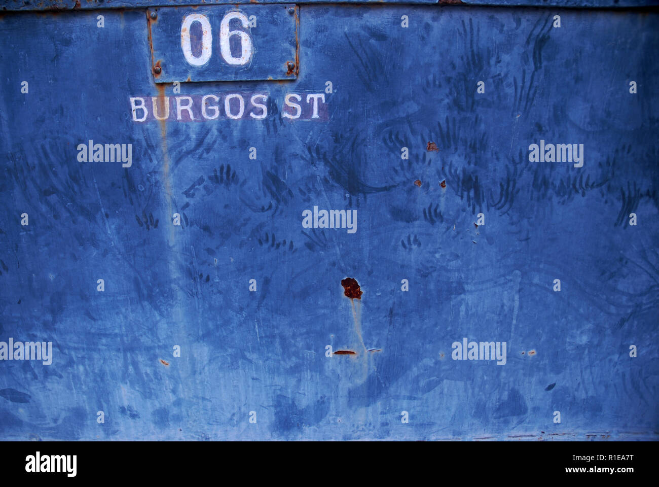 Painted blue front gate, 06 Burgos Street, Dumagette, Philippines Stock ...