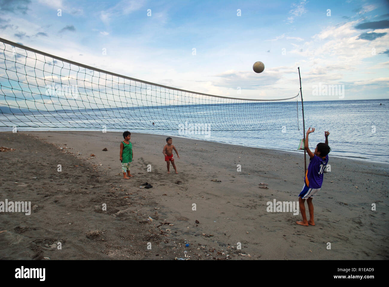 Boys playing volley ball, Escano Beach, Dumaguete, Negros Oriental ...