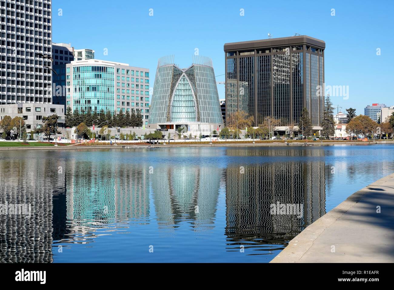 Buildings across Lake Merritt, on a clear day, Oakland, California, USA ...