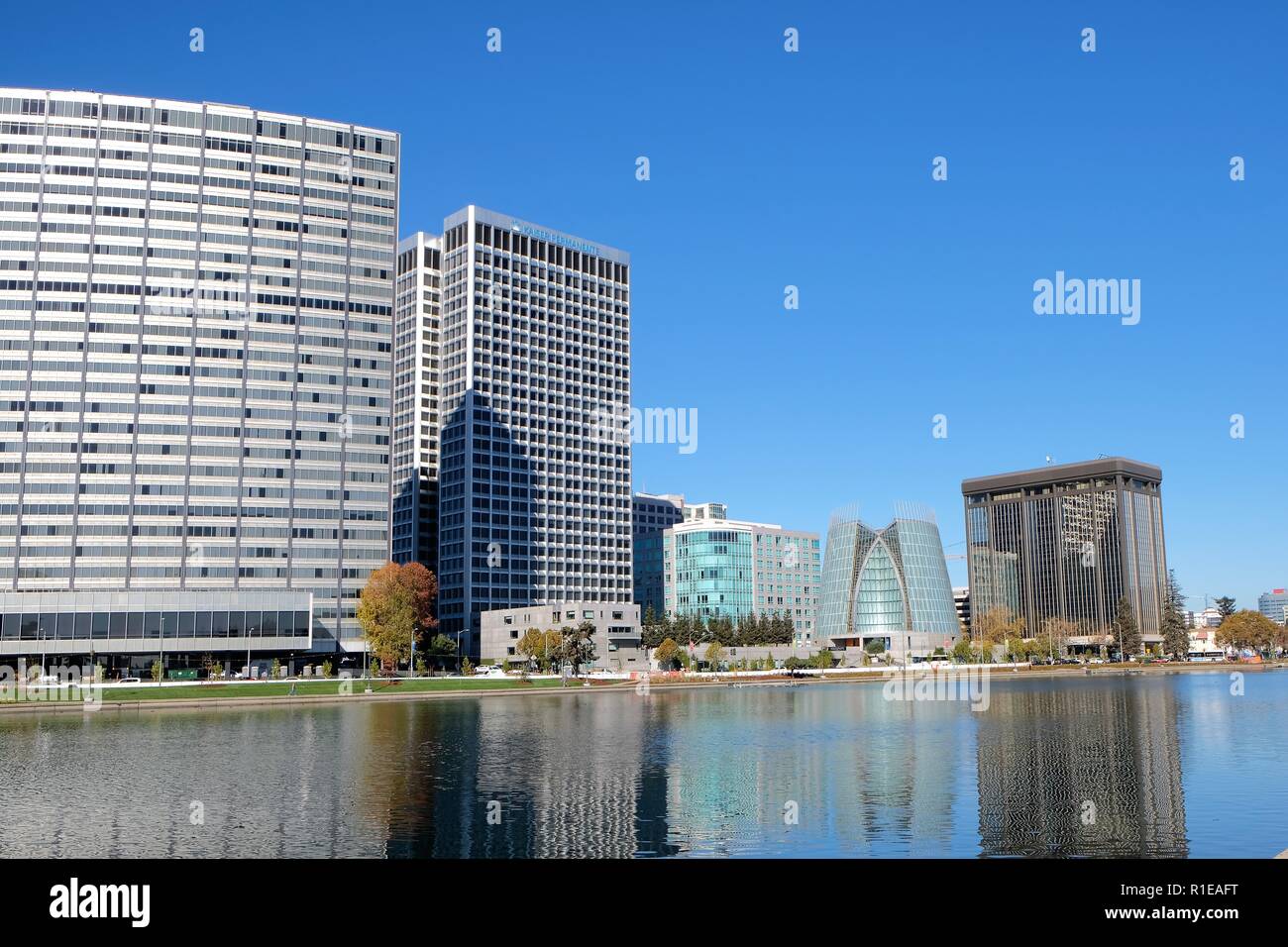 Buildings across Lake Merritt, on a clear day, Oakland, California, USA ...