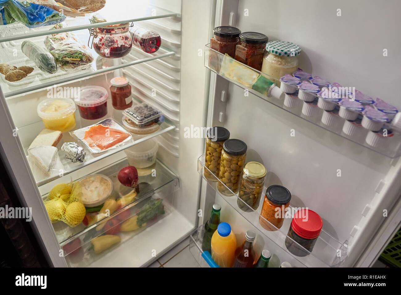 Refrigerator door open Stock Photo - Alamy
