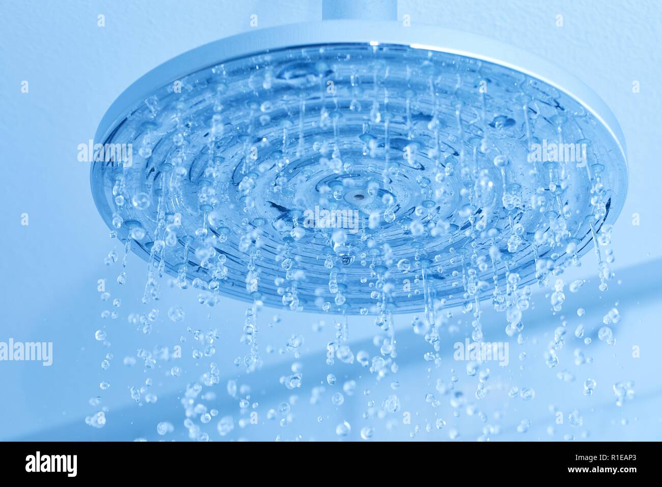 Shower water flowing Stock Photo - Alamy