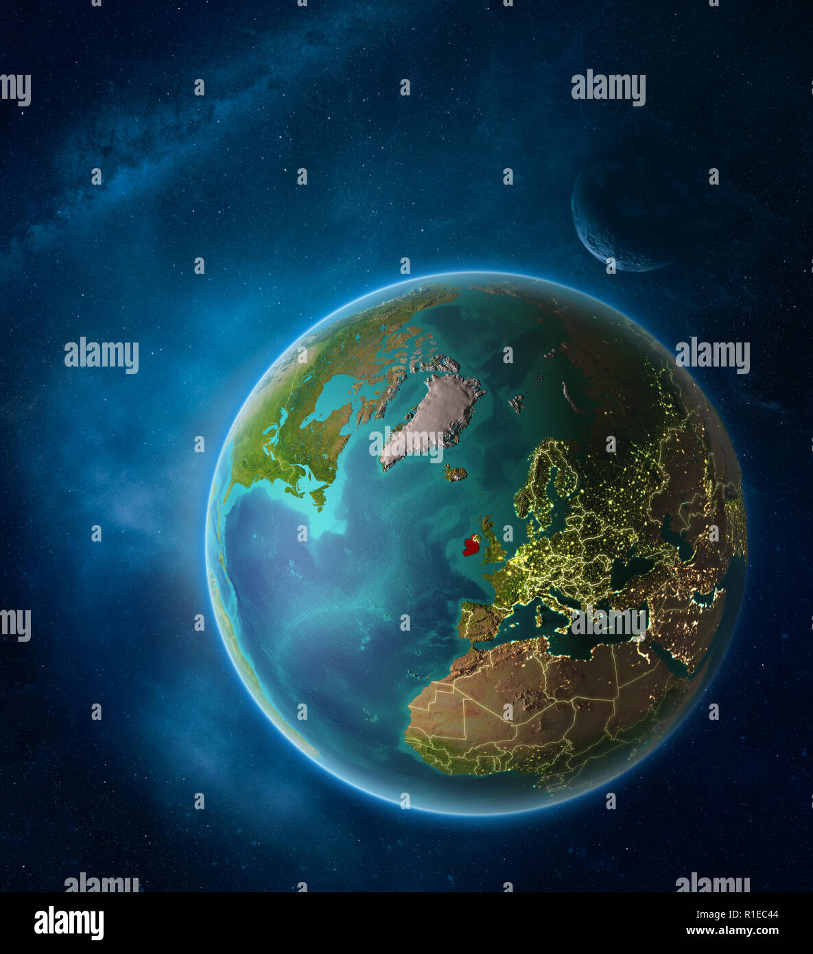 Planet Earth with highlighted Ireland in space with Moon and Milky Way ...