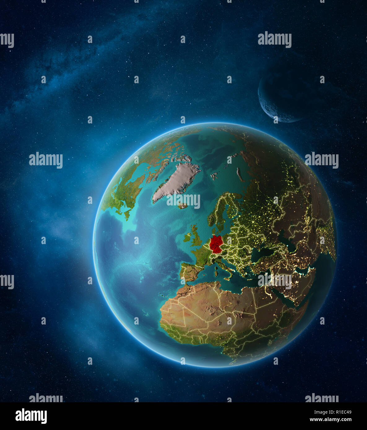 Planet Earth with highlighted Germany in space with Moon and Milky Way ...