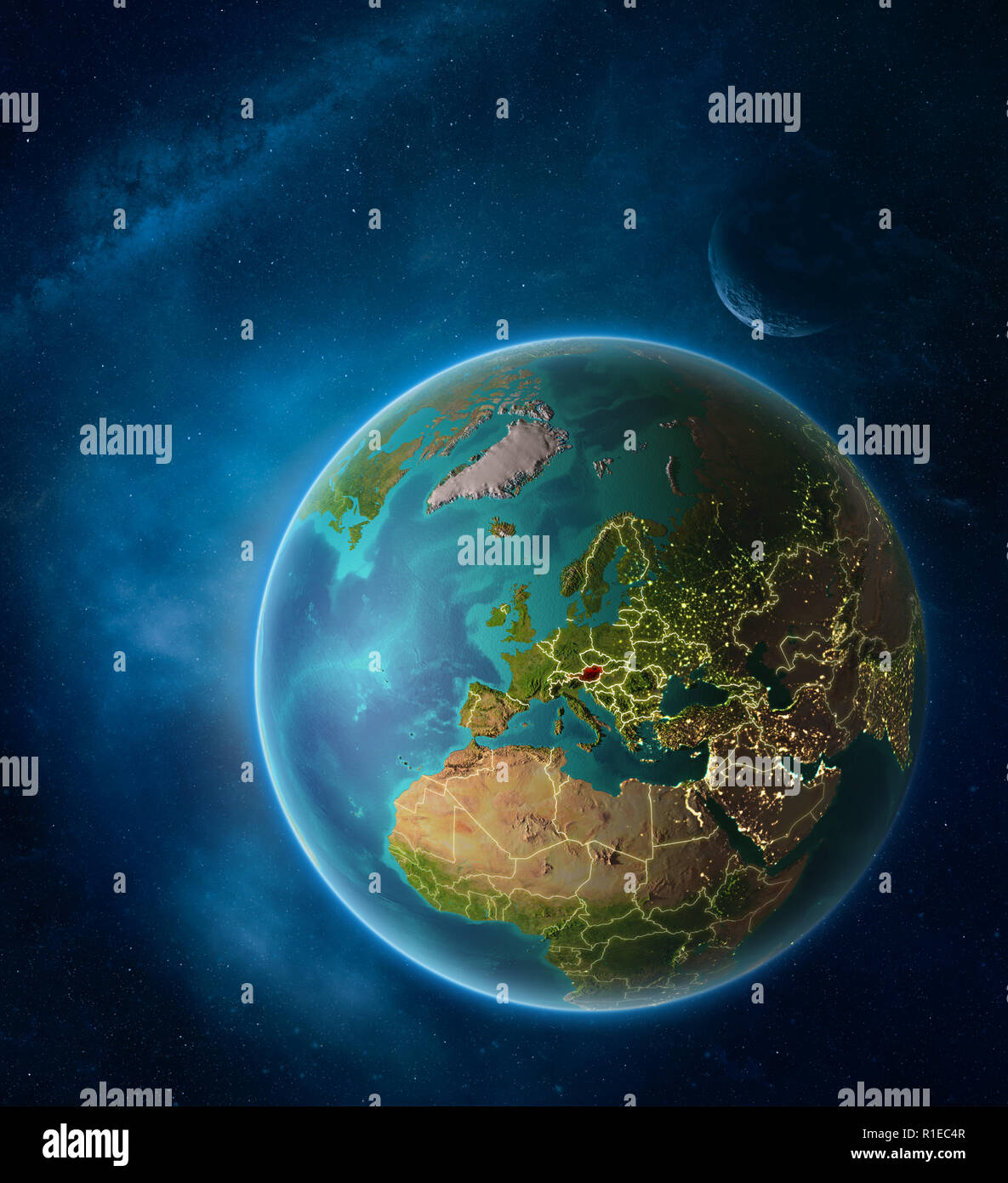 Planet Earth with highlighted Austria in space with Moon and Milky Way ...