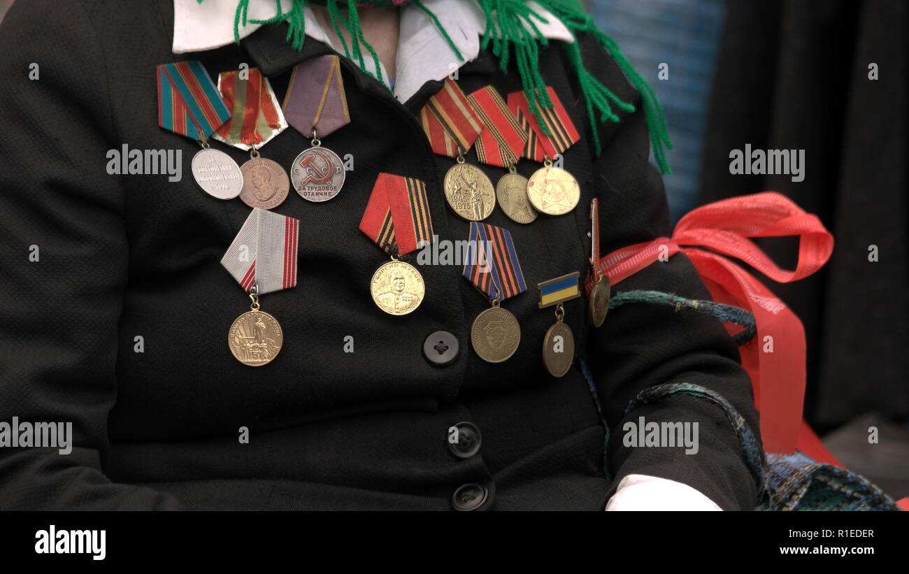 Different medals and orders on veteran chest Stock Photo - Alamy