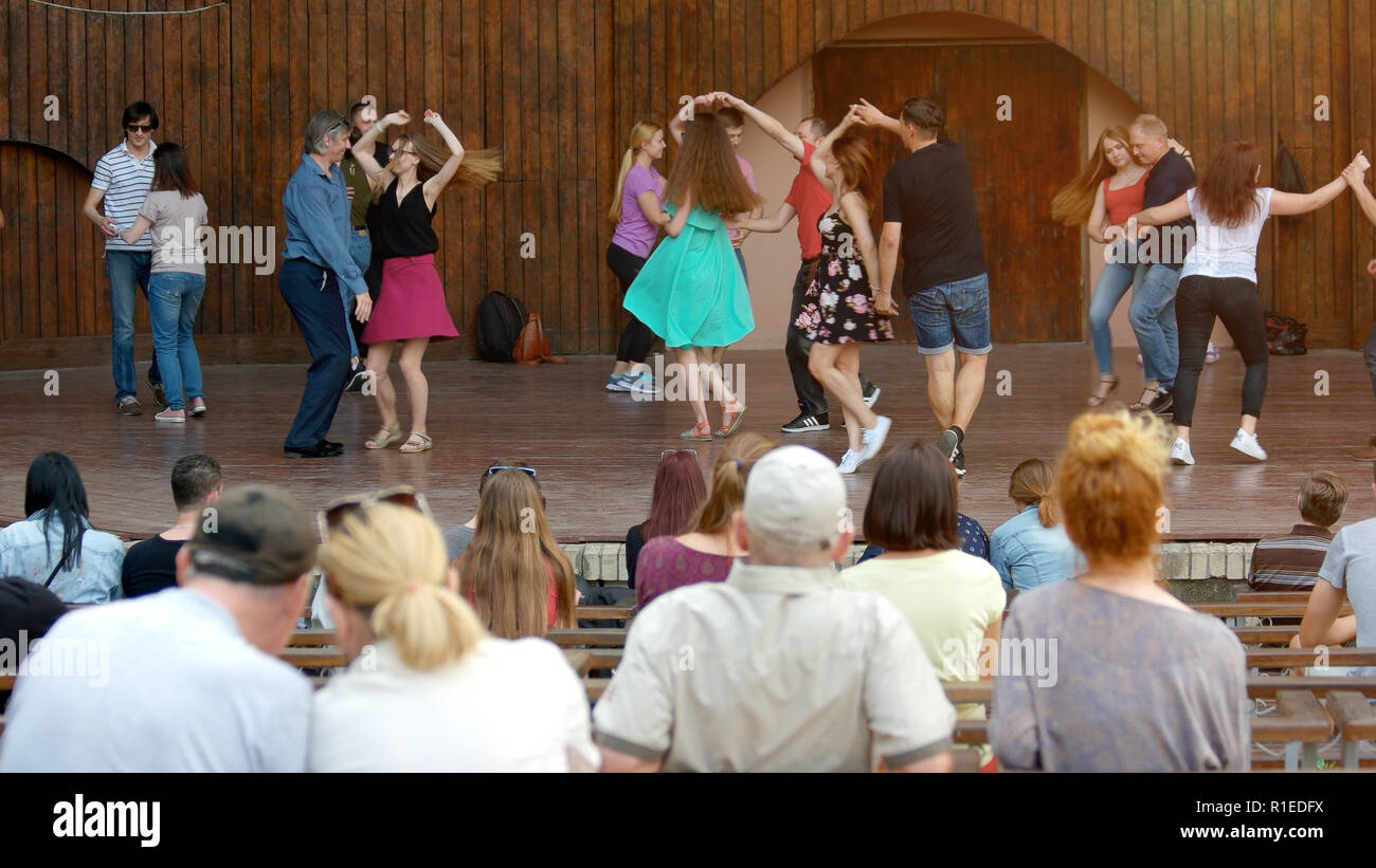 Young people dancing on the stage outdoor Stock Photo - Alamy
