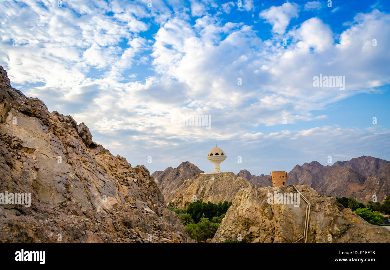 Muscat's famous frankincense burner monument under fluffy clouds and ...
