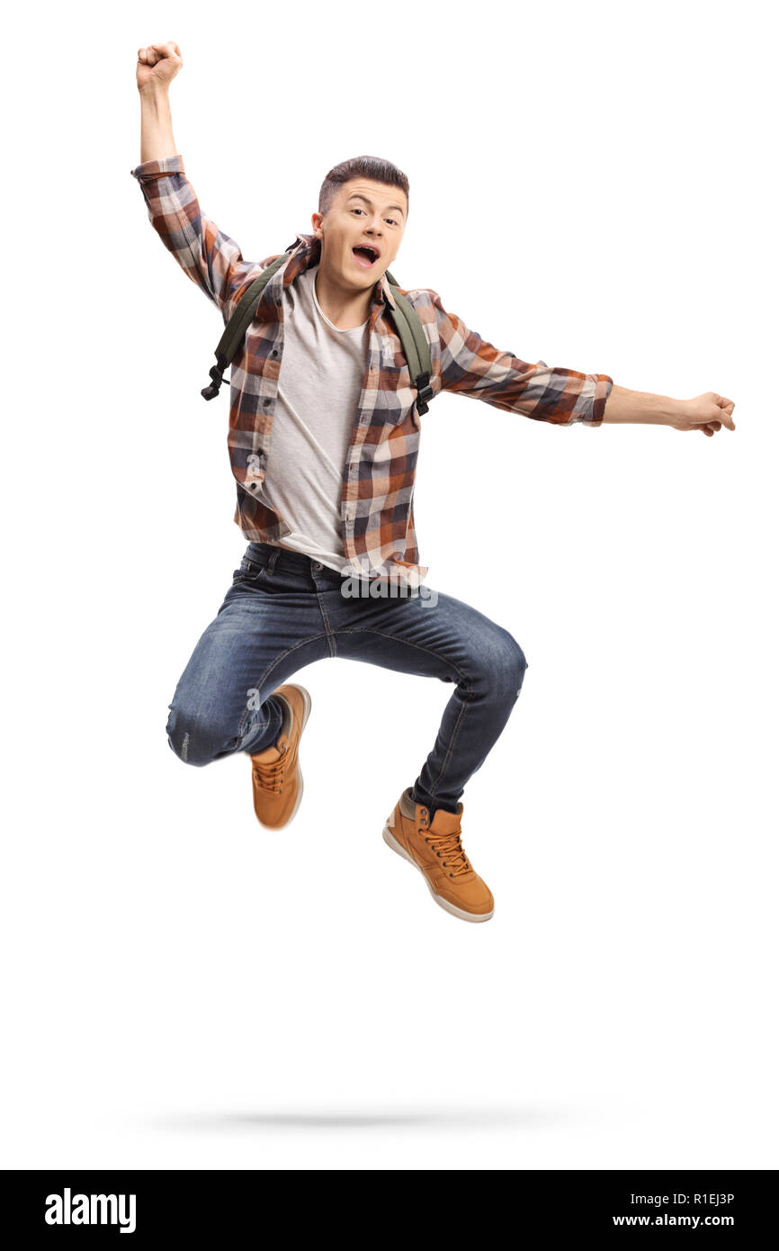 Full length portrait of a joyful teenage student jumping isolated on ...