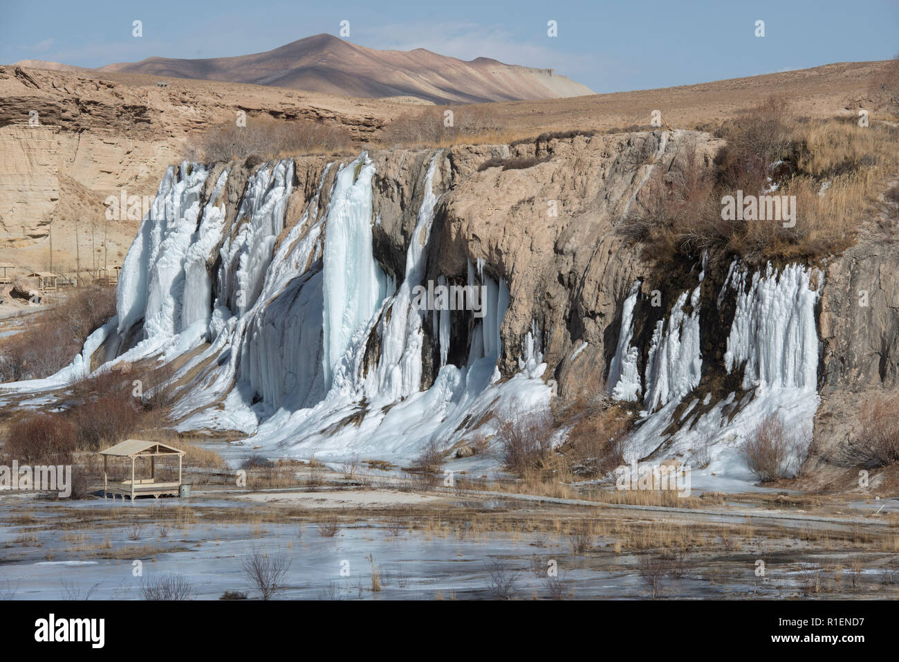 Frozen Waterfall Overflowing Natural Dam Made Of Travertine, Band-e ...