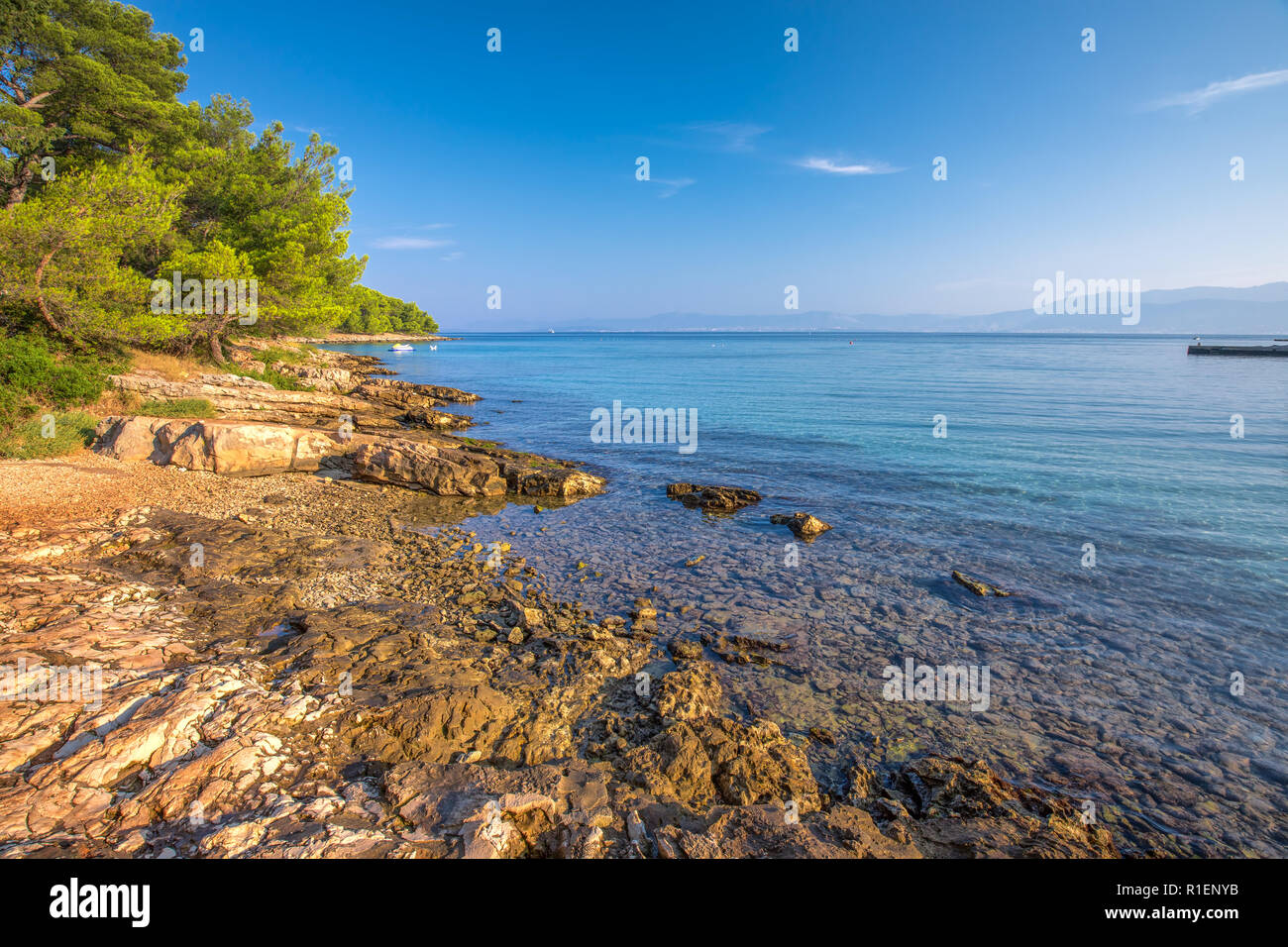 Pebble beach on Brac island with turquoise clear ocean water, Supetar ...