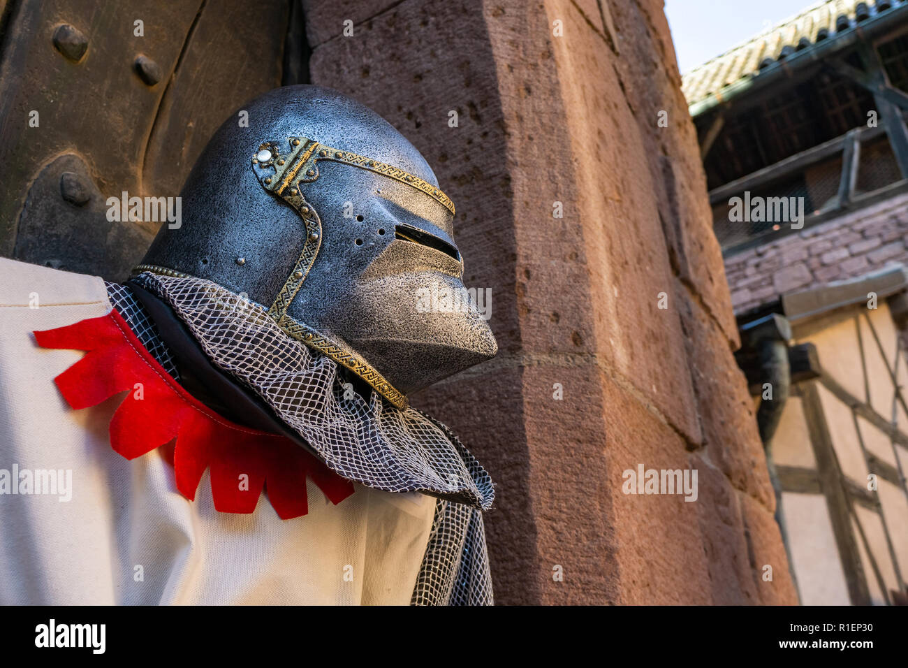 Medieval knight costume with helm, copy space on the right. Middle Ages ...
