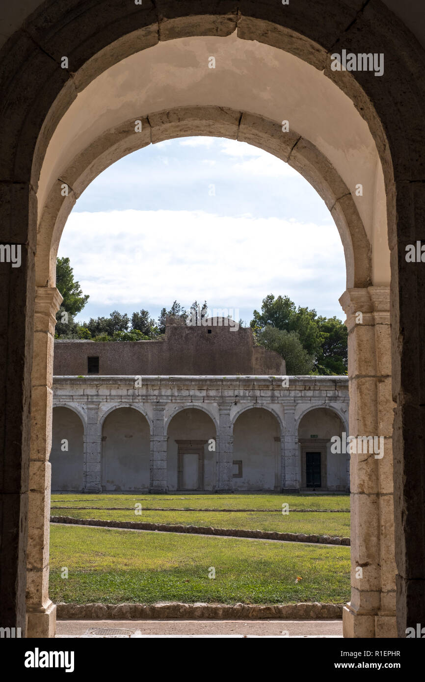 View through arch into the cloister at Certosa di San Giacomo, also ...