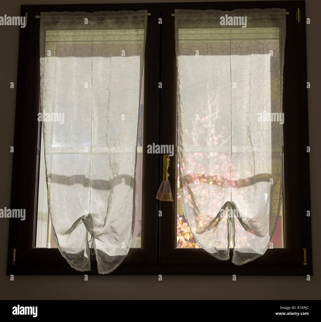 Light outside and shadow inside the window of the house Stock Photo - Alamy