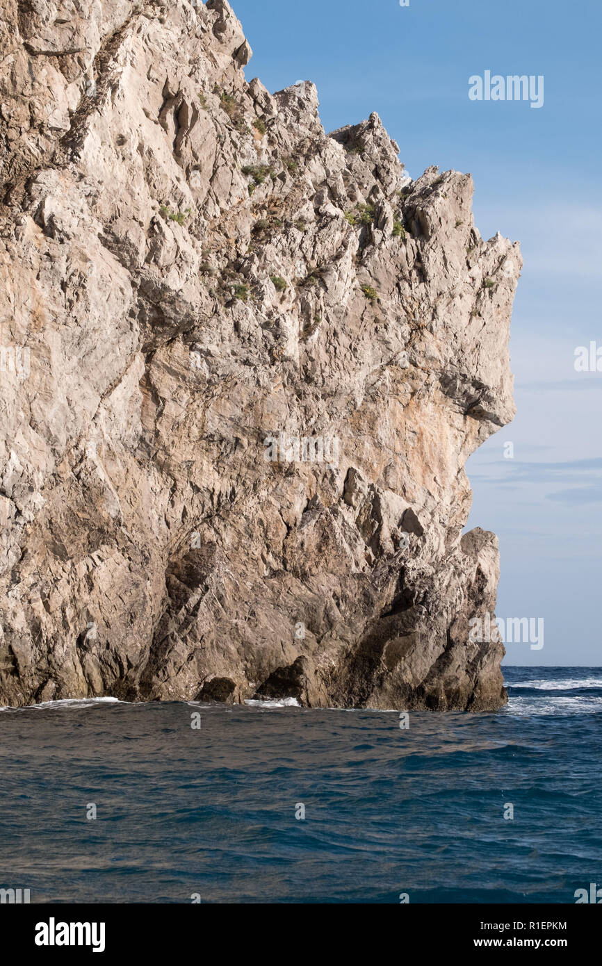 Caves in the cliffs on the island of Capri in the Bay of Naples, Italy ...
