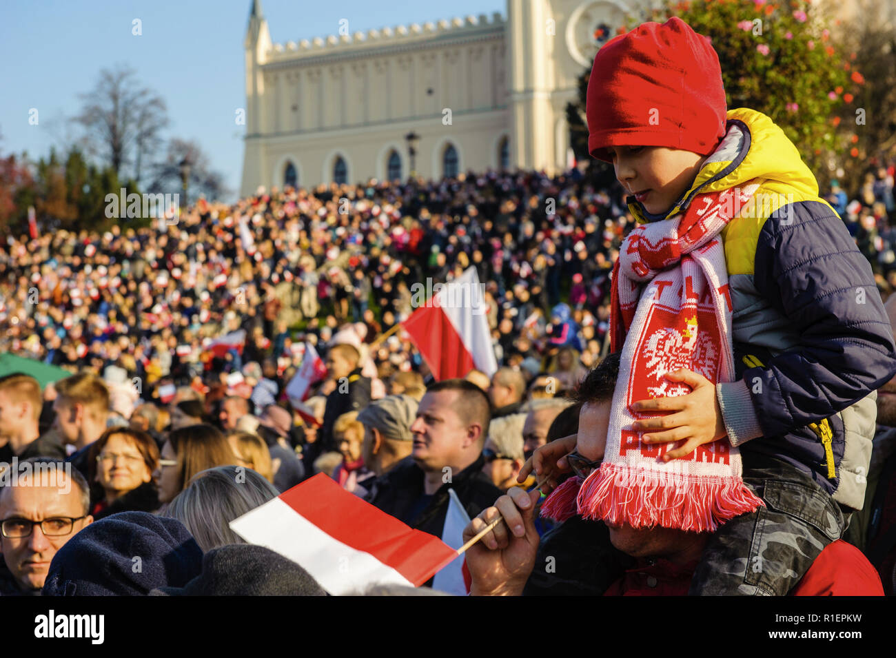 Boy watching parade hi-res stock photography and images - Alamy